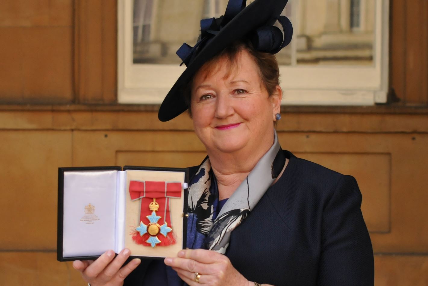 Director of the Institute of Health Visiting receives CBE at Buckingham ...